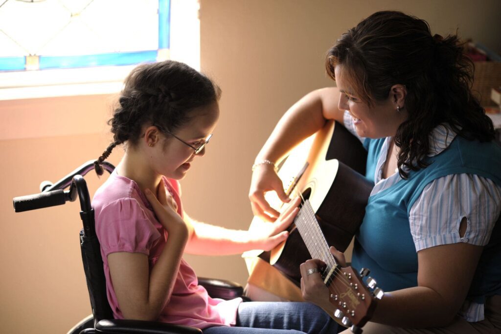 Tune into the Benefits of Music Therapy - AmeriDisability